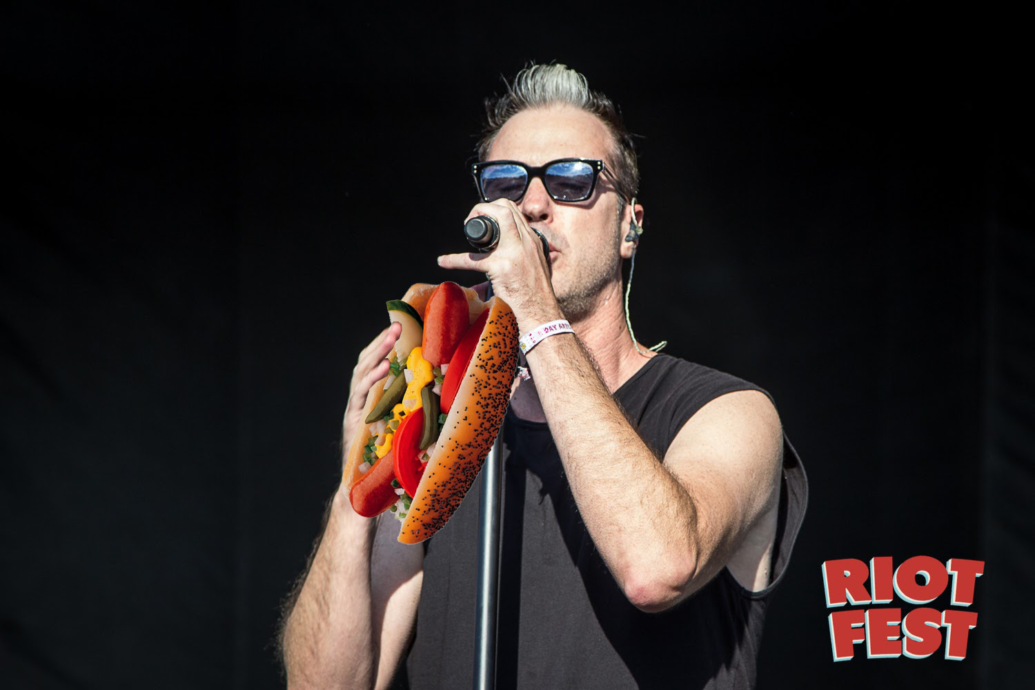 Musicians Enjoying Hot Dogs at Riot Fest - Riot Fest